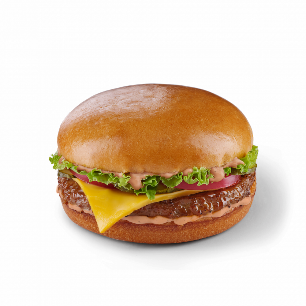 Two juicy cutlets from beef, two slices of Chedder cheese, round pieces ...